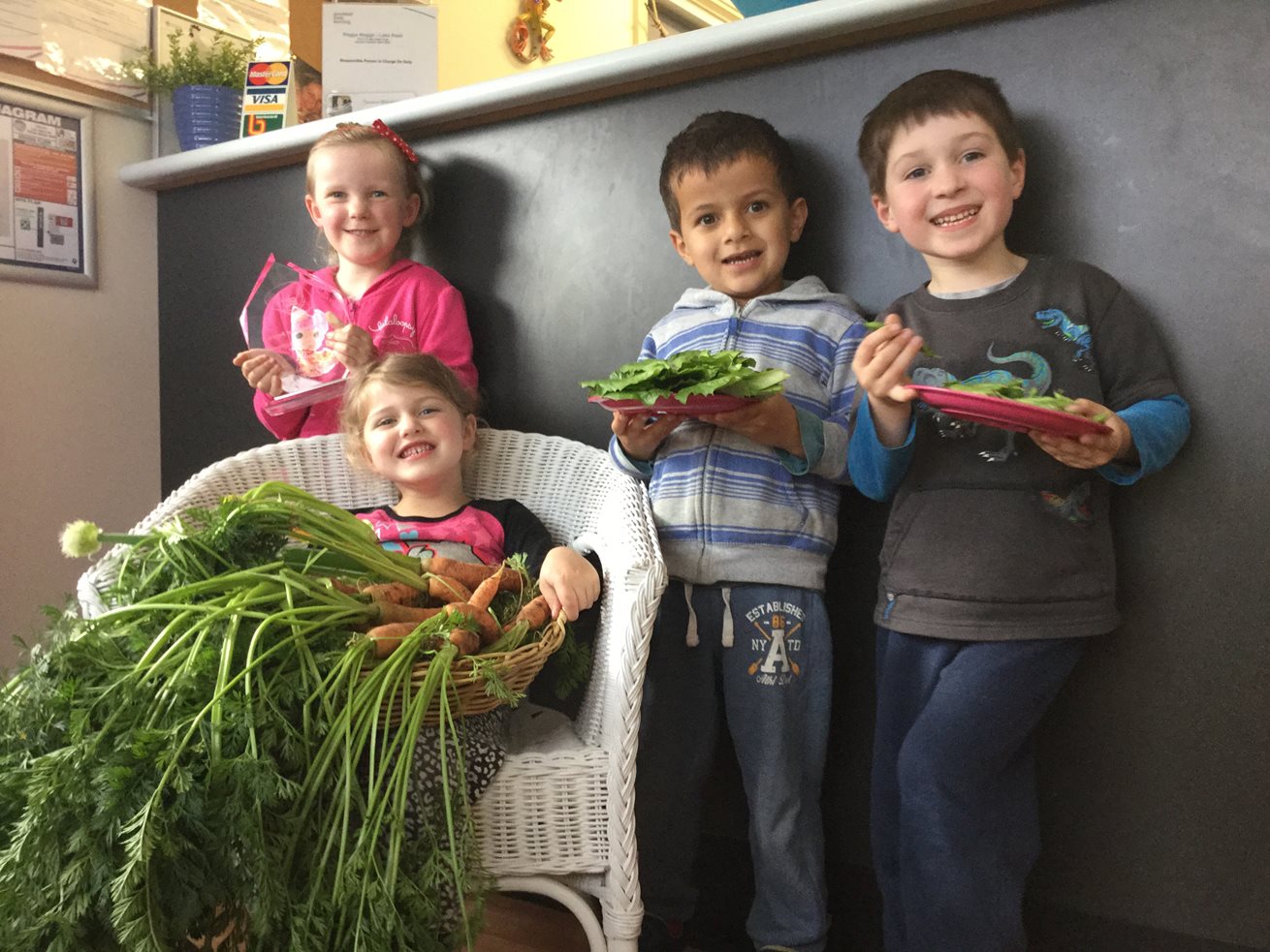 Preschoolers harvest veggies | Goodstart